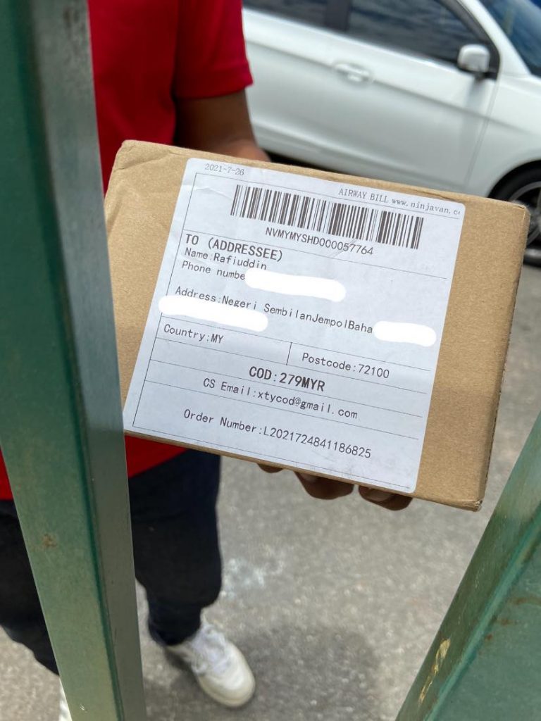 Malaysian Woman Escapes Empty COD Parcel Scam With Courier's Help