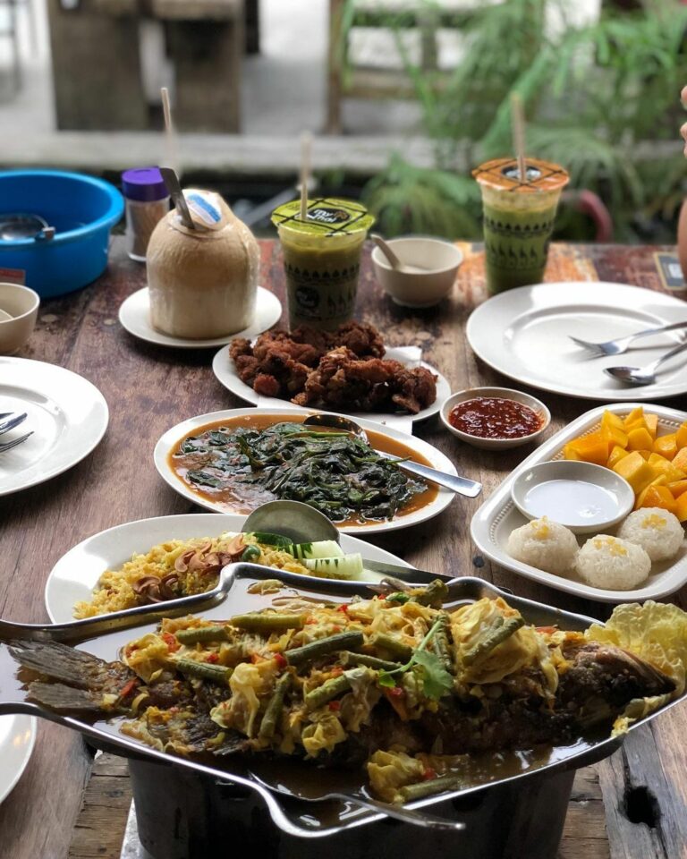 Khunthai Village Restaurant Has Hut-style Dining Seats & A Koi Pond