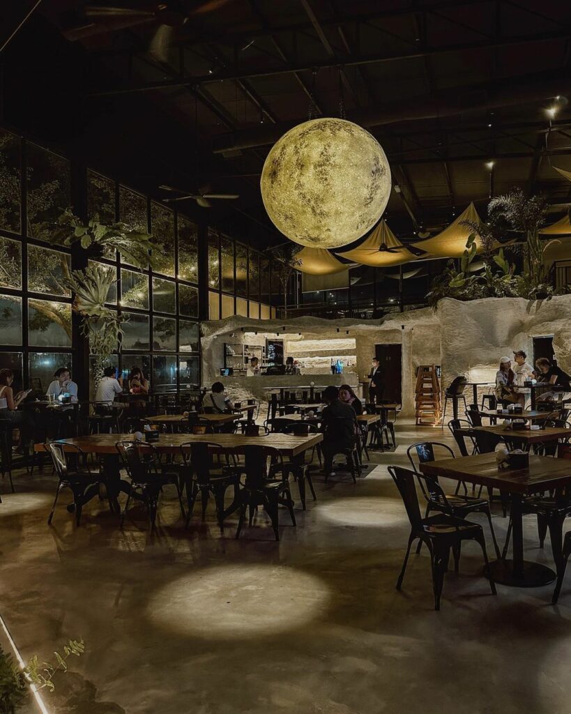 BlackCamp In PJ Has A Huge Moon "Chandelier" & Camping-Style Seats