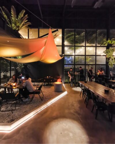 BlackCamp In PJ Has A Huge Moon "Chandelier" & Camping-Style Seats