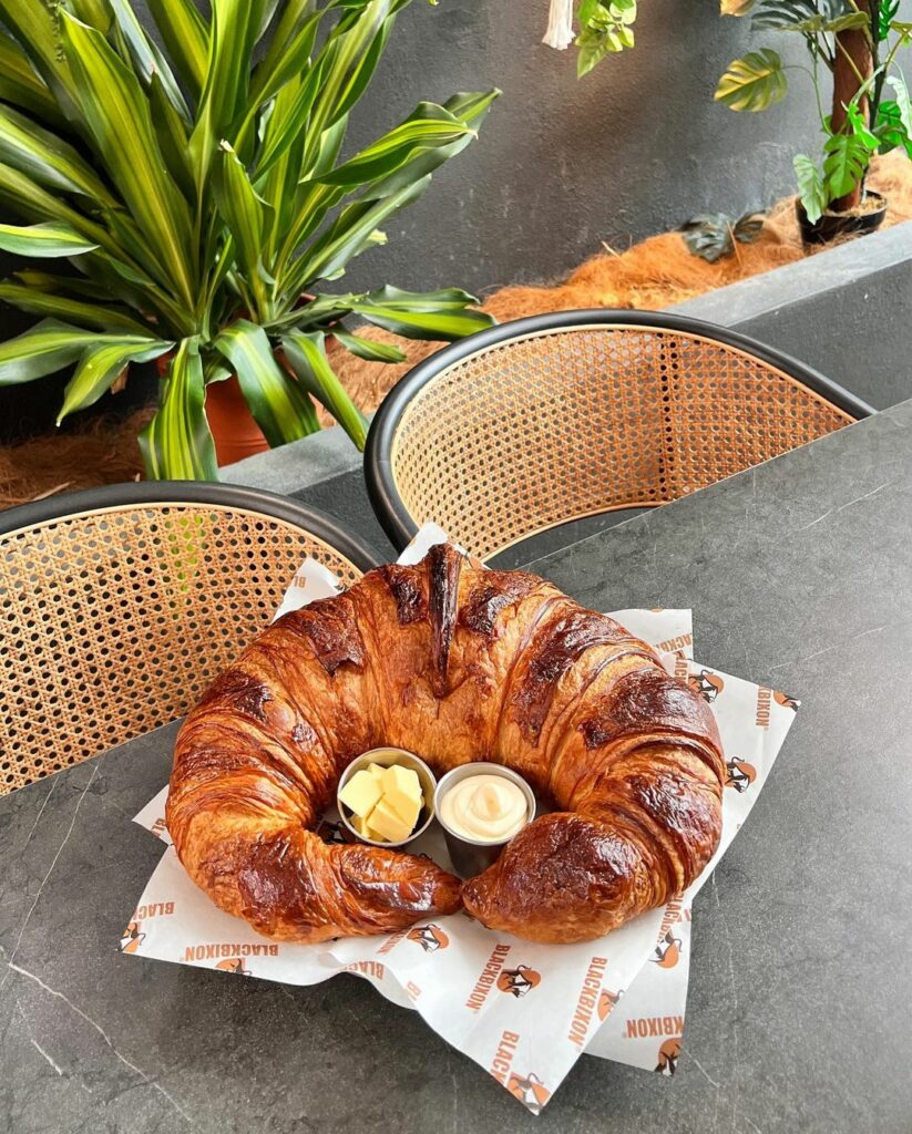 This Cafe In KL Has Giant Croissants That Look Like Monster-Sized Crabs